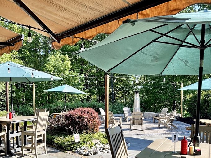 Summer serenity served tableside. This patio setting under green umbrellas is where breakfast memories are made.