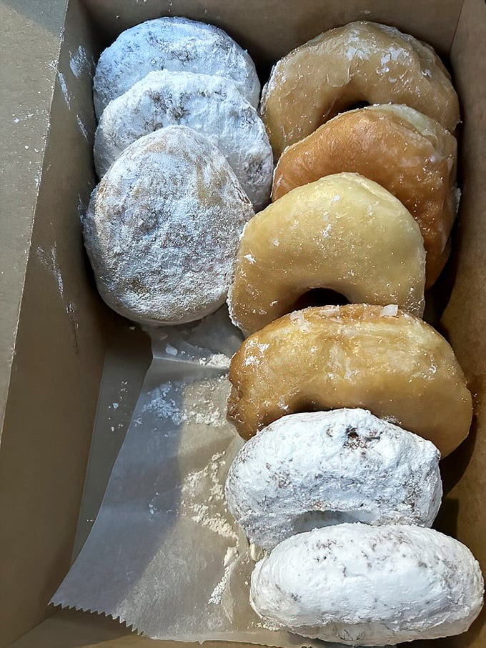 The powdered donuts and glazed classics nestled together in their cardboard home&mdash;like the comfort food version of a family portrait.
