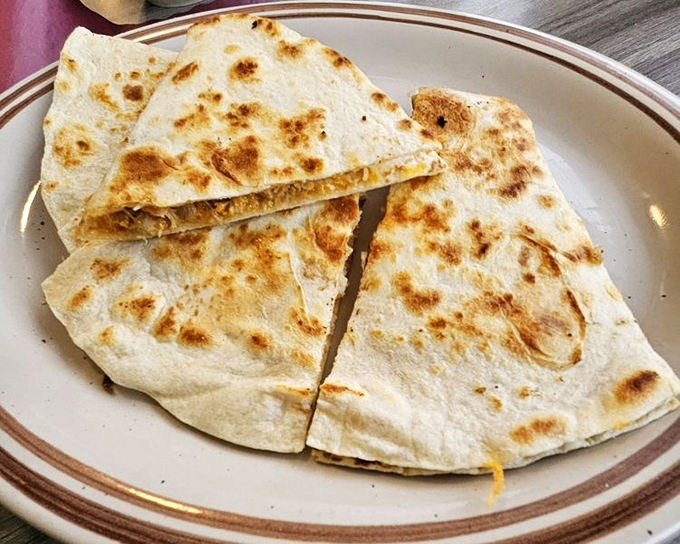 Quesadillas with that perfect griddle char&mdash;where cultures collide on your taste buds. Crispy exterior, melty interior, and the promise of cheese pulls with every bite.