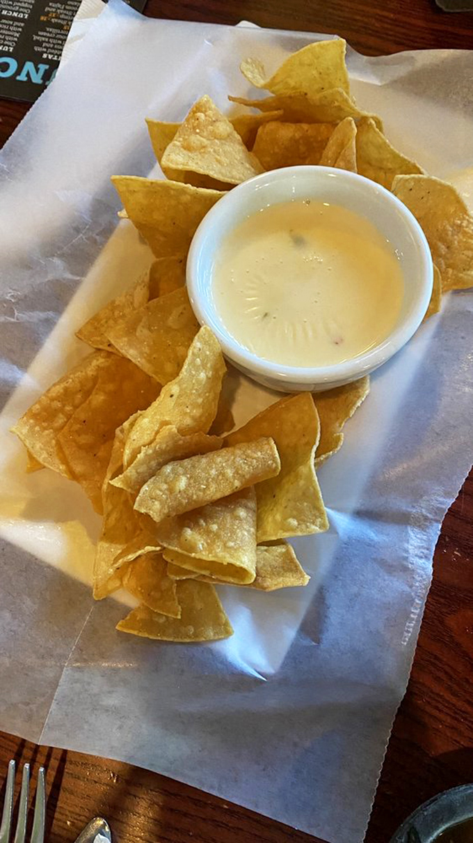The queso dip and house-made chips relationship status: It's complicated. You'll start with "just one more" and end with an empty basket.
