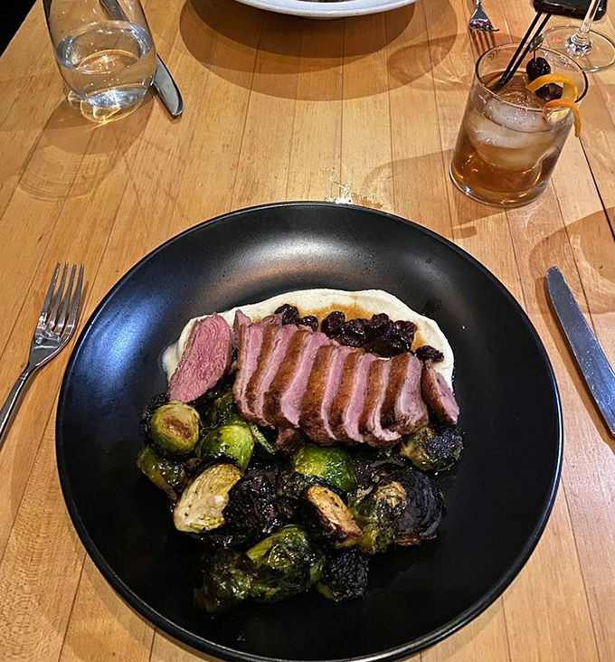 Duck breast that makes you realize why the phrase "rare bird" is a compliment, accompanied by Brussels sprouts so good they could convert any skeptic.