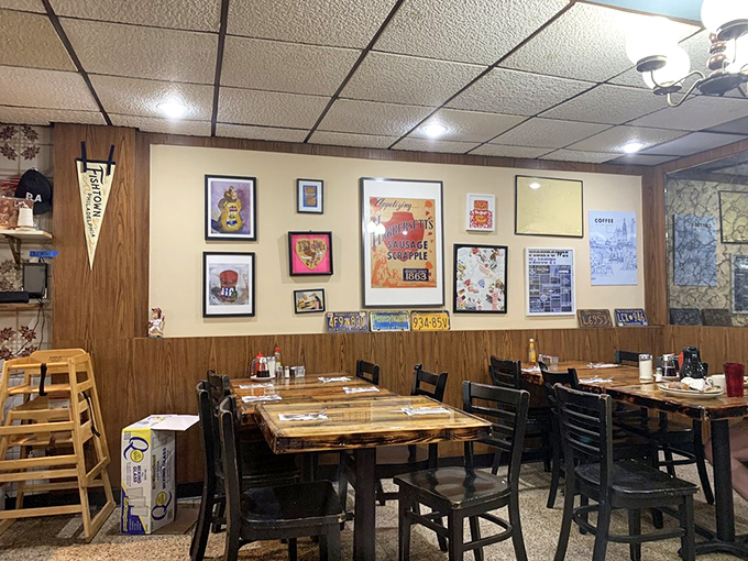 Sports memorabilia and vintage signs create dining room walls that tell Philadelphia's story one framed memory at time.