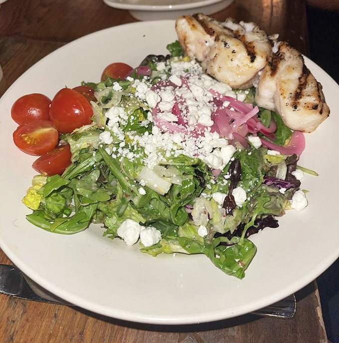 A salad that actually excites&mdash;fresh greens playing host to grilled shrimp, feta, and vegetables that clearly weren't trucked in from another time zone.
