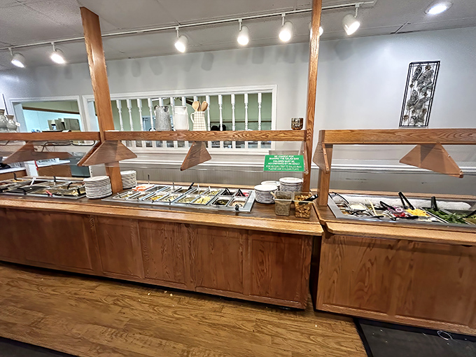 The buffet line&mdash;where good intentions about "just a small plate" go to die. Wood paneling and sneeze guards: the unsung heroes of Amish dining.