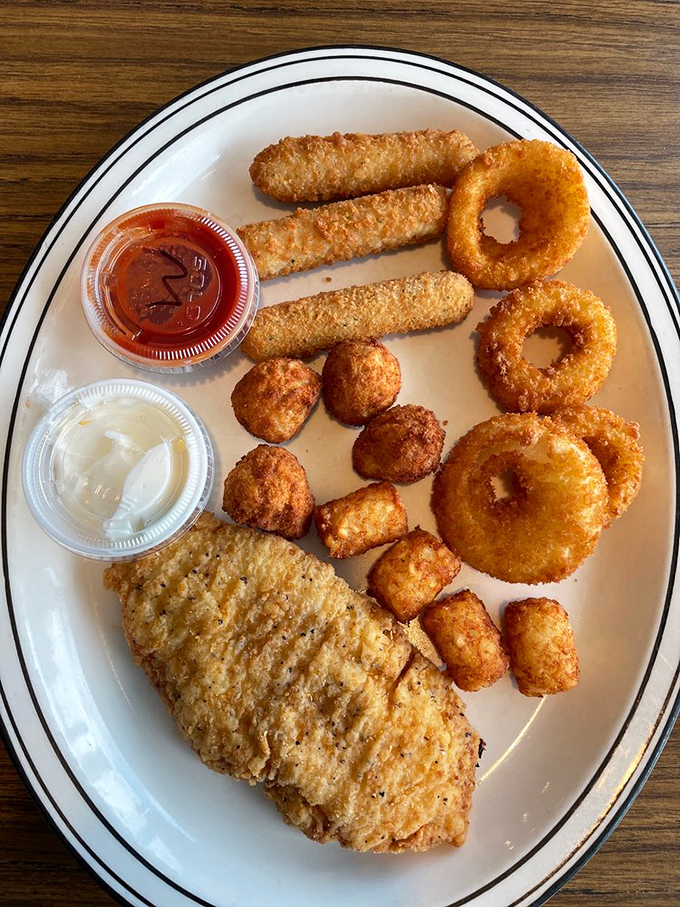 A golden-fried sampler platter that says, "Life's too short to choose just one side"&mdash;truly democracy on a plate.