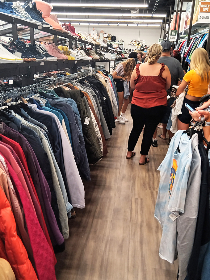 The thrill of the hunt in action. Fellow shoppers navigate the well-stocked aisles with the focused determination of truffle-hunting pigs.