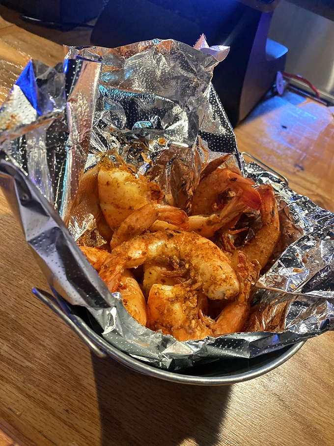 Seasoned shrimp nestled in foil, ready to deliver that perfect snap between your teeth. Simple pleasures are often the most profound.