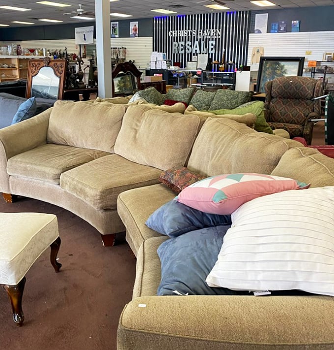 The curved sectional sofa&mdash;where family arguments and holiday naps have equal billing. Just add throw pillows and you're home.