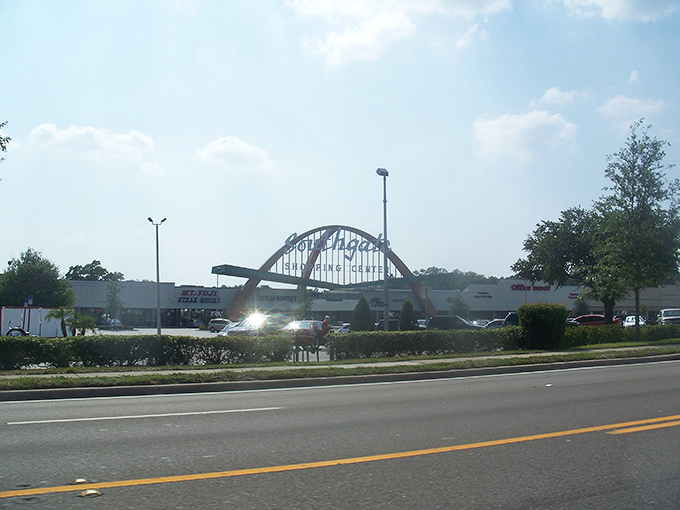 Southgate Shopping Center's distinctive arch welcomes shoppers with mid-century flair &ndash; a shopping experience with a side of architectural nostalgia.