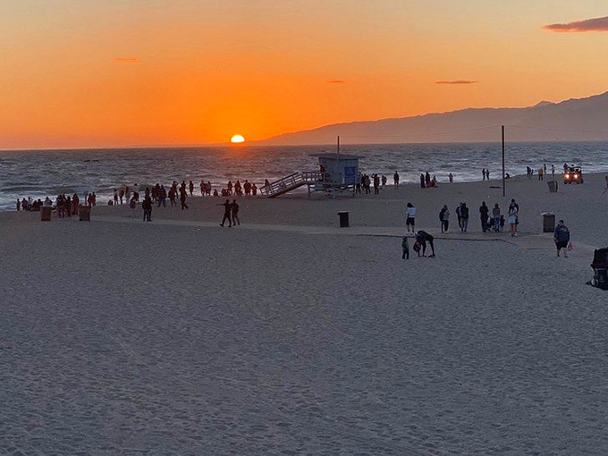 Mother Nature's nightly masterpiece turns the Santa Monica shoreline into a canvas of impossible oranges and purples. No filter needed.