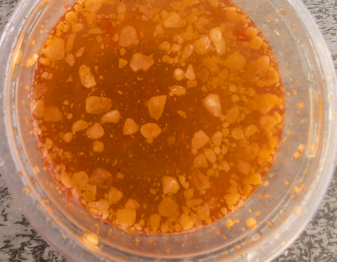 The sauce that launches a thousand return trips&mdash;a sweet, spicy, garlicky elixir that would make cardboard taste good, though it deserves better company.