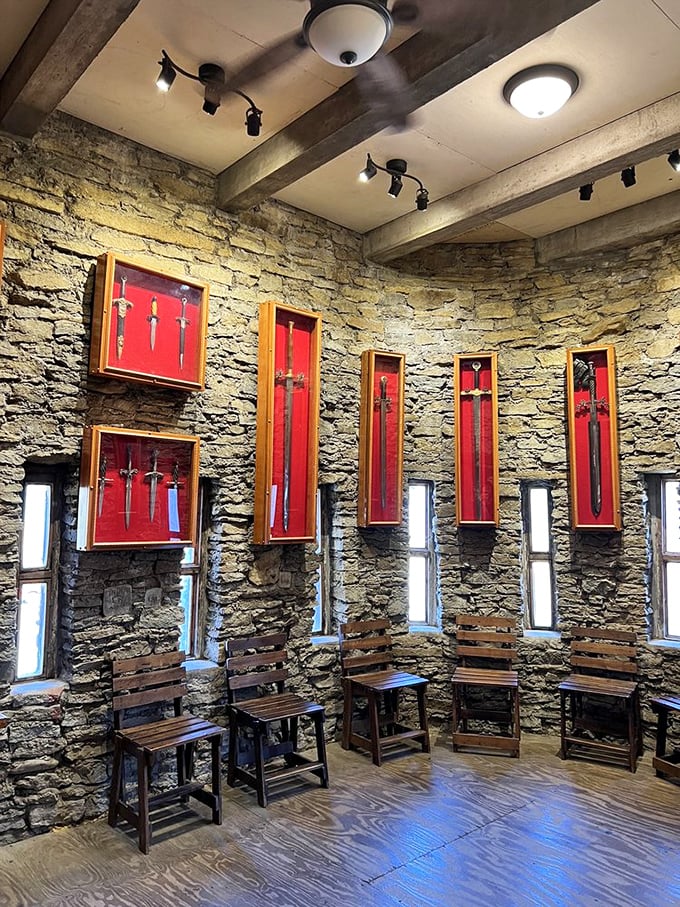 This impressive sword collection would make Excalibur jealous. Each blade mounted against crimson backdrops like metallic works of art. 