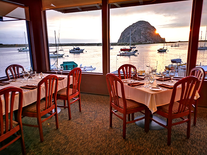 Not just a view&mdash;a front-row seat to nature's greatest show, where Morro Rock stands sentinel as boats bob gently in golden hour light.