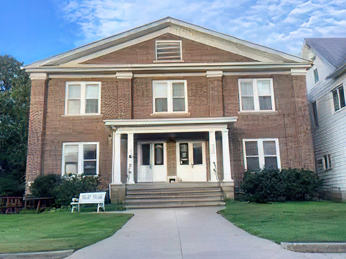 Classic brick building anchors the downtown district where neighbors still know each other's middle names.