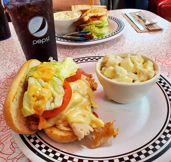 Breakfast engineering at its finest&mdash;cheese sauce, crispy potatoes, and eggs create a morning masterpiece that requires both a fork and a nap afterward.