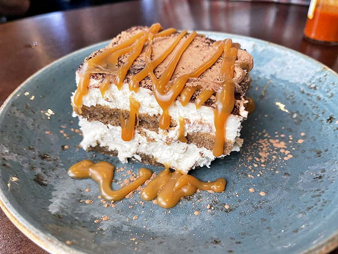 Layers of chocolate, cream, and caramel create a dessert that's worth every calorie. Diet plans come here to die happy.