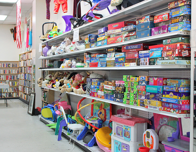 Childhood joy stacked on metal shelves &ndash; from barely-loved stuffed animals to board games with all their pieces, miraculously intact and ready for new adventures.