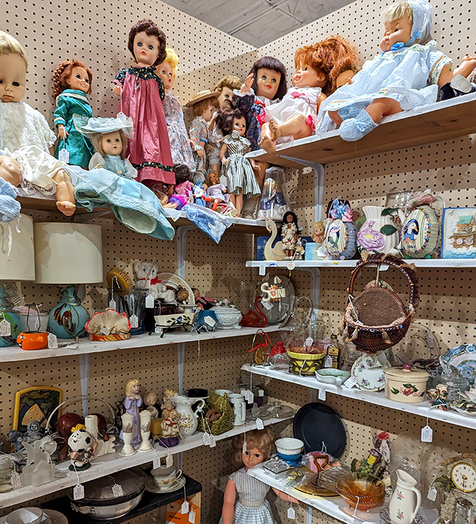 The doll section: where childhood memories and mild nightmares converge as vintage toys silently judge your adult fashion choices.