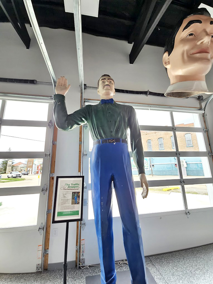 "The Traffic Stopper" indeed! This green-jacketed giant with his eternally raised hand once directed motorists toward service stations across mid-century America.