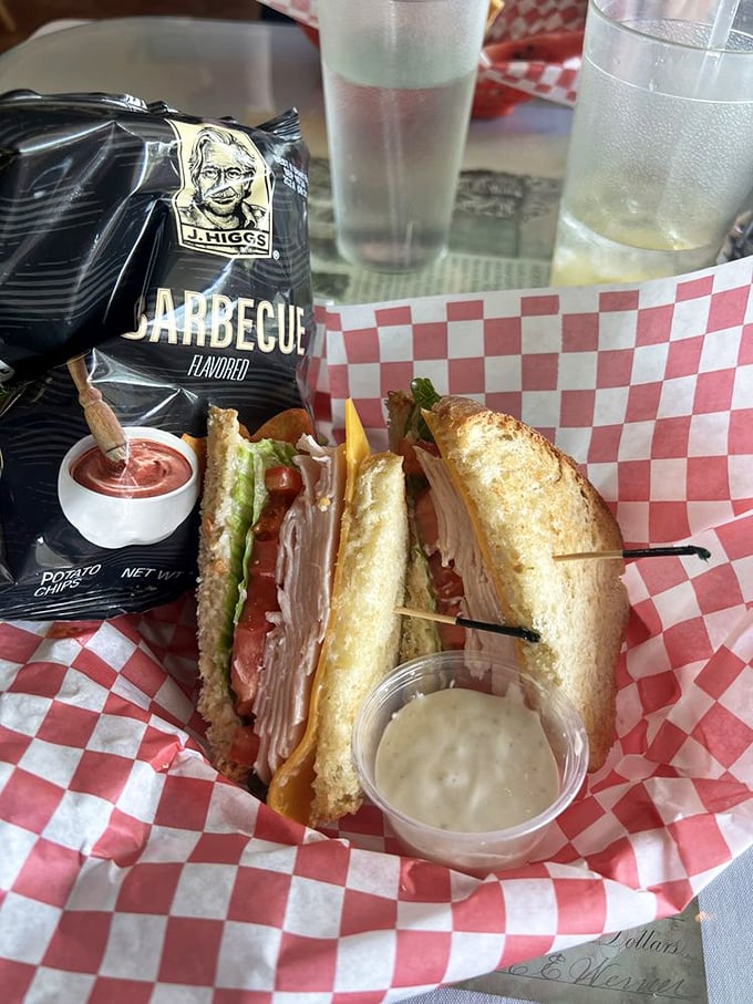 Sandwich architecture at its finest. Fresh-baked bread cradles layers of turkey and veggies with the structural integrity that would impress Frank Lloyd Wright. 