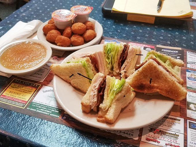 The club sandwich&mdash;architecture you can eat. Perfectly stacked layers of turkey, bacon, and veggies between toast triangles that mean business.