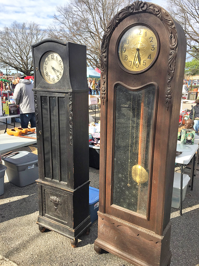 Grandfather clocks standing like sentinels of a bygone era. They've been keeping time since before smartphones made wristwatches optional.