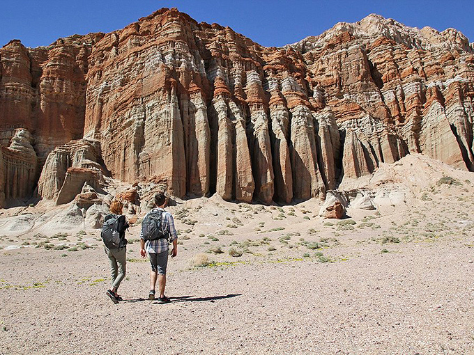 Dwarfed by nature's grandeur, hikers gain perspective. Nothing makes your problems seem smaller than standing beside rocks that predate human civilization.