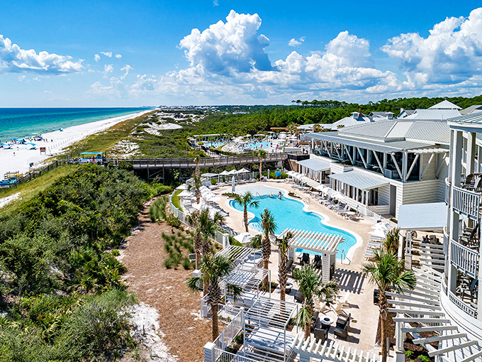 Resort living at its finest with that pool practically begging you to cancel your afternoon plans. The beach views are just showing off at this point.