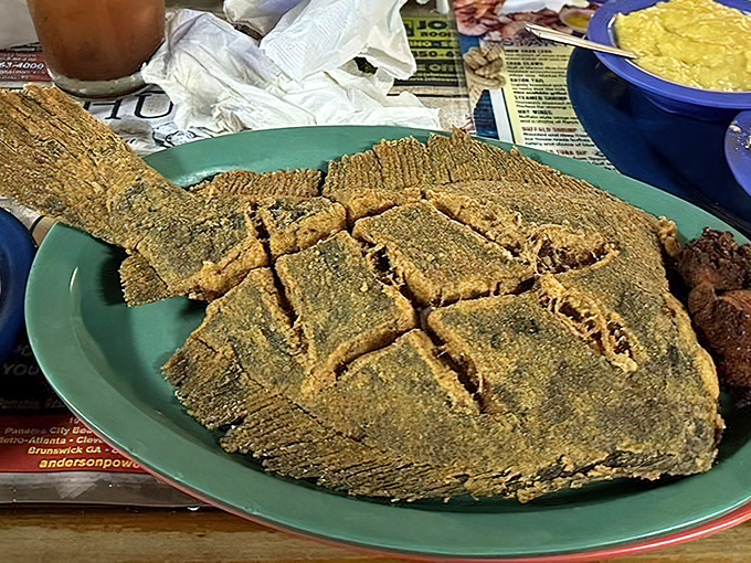 This whole flounder isn't just dinner&mdash;it's performance art. The fish equivalent of "go big or go home" presented on a humble plate.