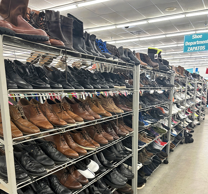 Men's shoes lined up like soldiers awaiting inspection. From beach-ready sandals to boardroom-worthy oxfords, all at prices that won't kick your budget.