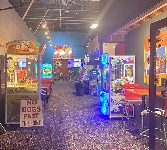 The arcade area glows with neon promise, proving that Country Junction understands shopping is just one form of entertainment under their massive roof.