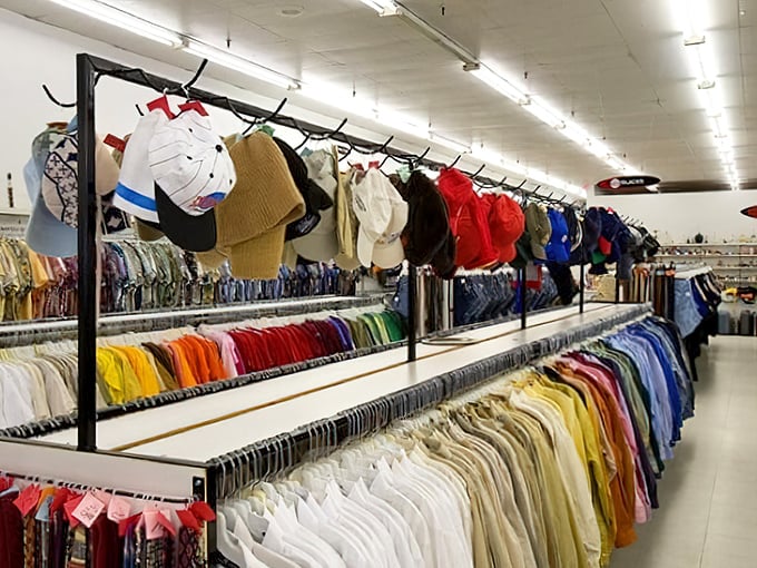 Hat heaven! A rainbow of headwear options hanging like colorful fruit, ready to crown shoppers with style at bargain basement prices.