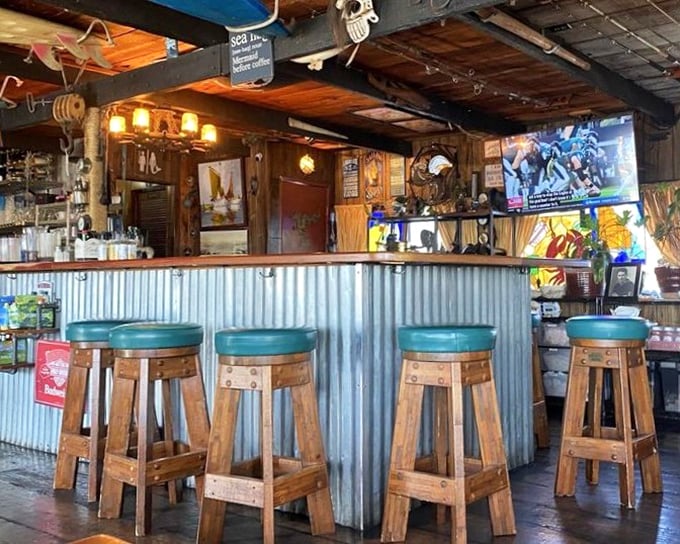 The bar's corrugated metal and wooden stools aren't trying to impress anyone, which is precisely why they're so impressive.