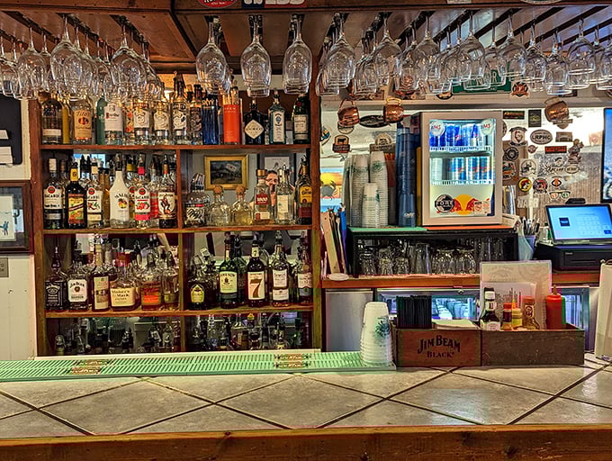The bar area doesn't need fancy mixologists or Edison bulbs—just honest pours and decades of coastal conversations.