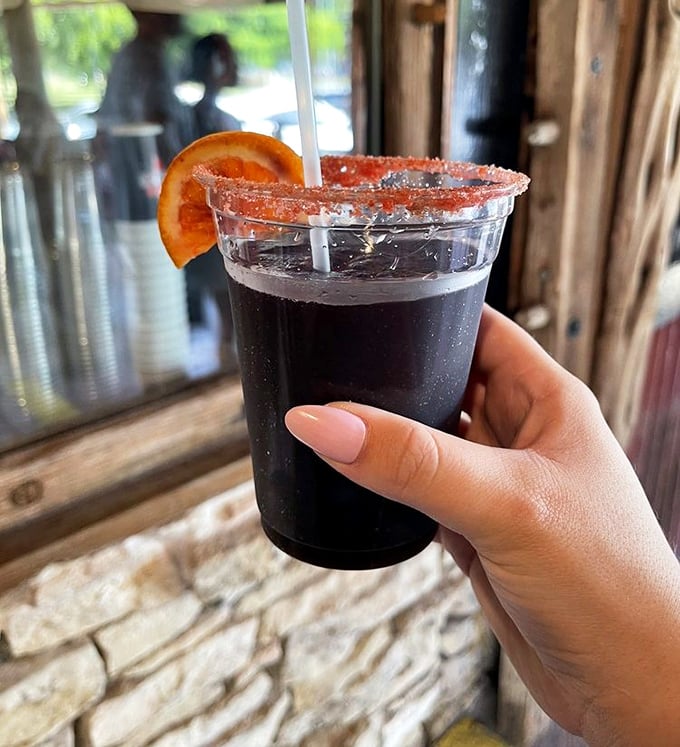 Even the drinks at Terry Black's come with attitude. This black margarita with its chile-salt rim is the perfect palate cleanser between bites of smoky perfection.