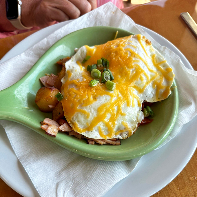 A skillet that works harder than most people do on Monday morning. Melted cheese blankets a treasure trove of breakfast favorites.