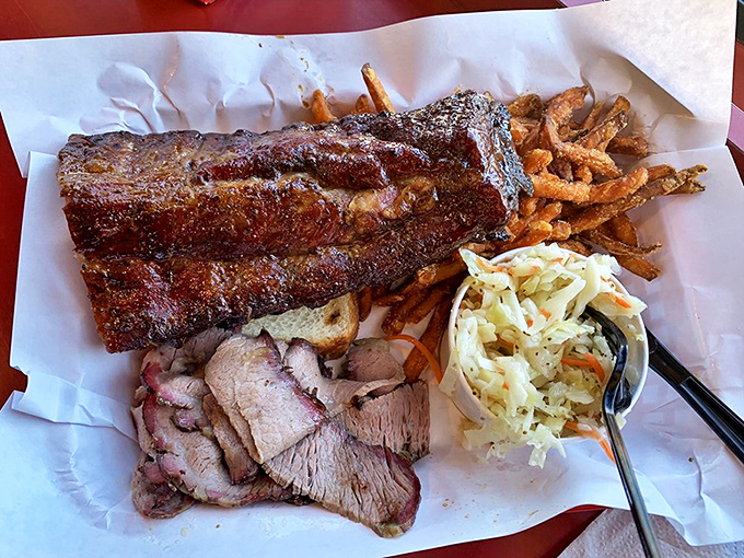 This brisket and ribs combo isn't just lunch&mdash;it's a commitment to excellence that rewards you with each tender, smoky bite.