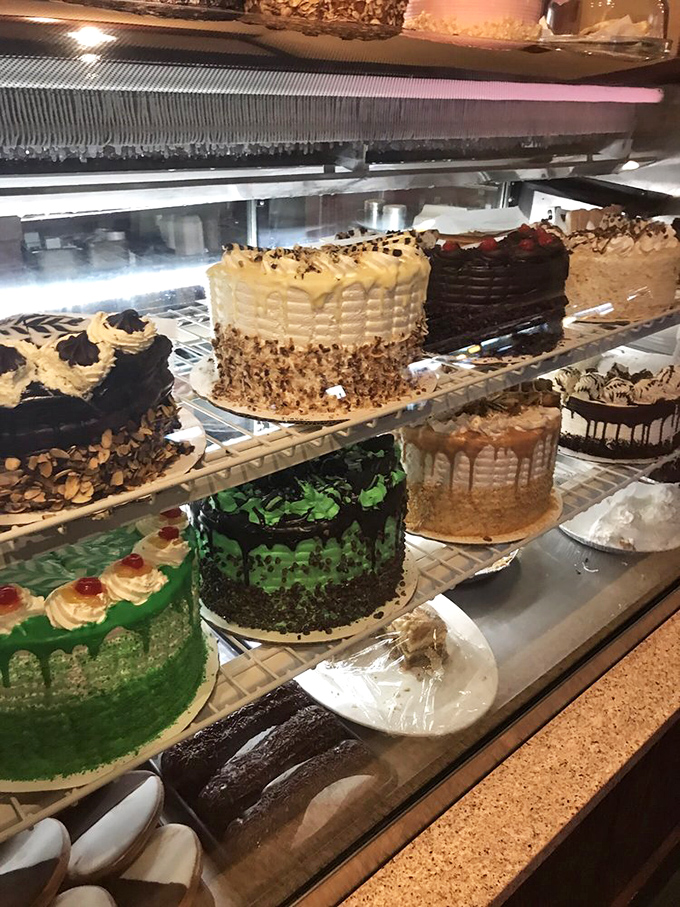A dessert case that should come with a warning label. Each cake looks like it could star in its own food network special.
