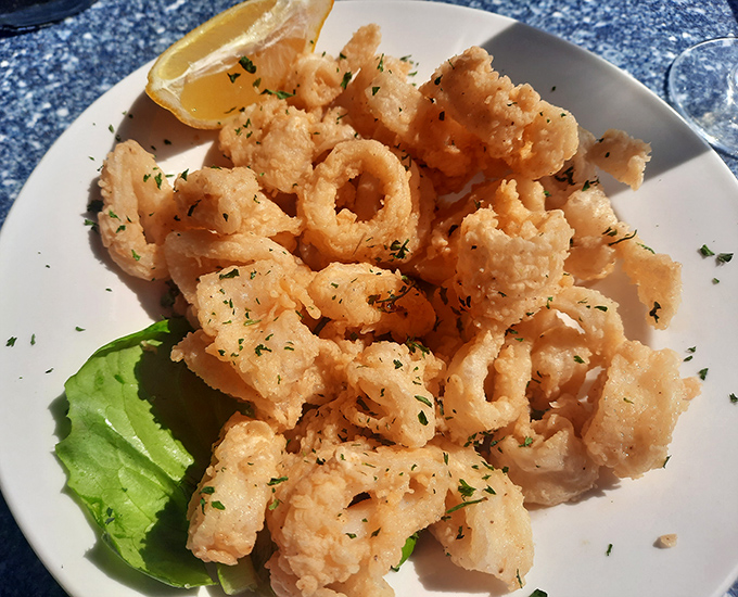These calamari aren't just fried&mdash;they're transformed into crispy, golden halos that make you forget you're eating something that once swam in the ocean.