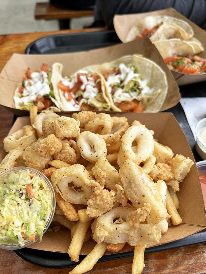 Calamari, tacos, and slaw &ndash; the holy trinity of coastal dining that transforms an ordinary meal into a Pacific celebration.
