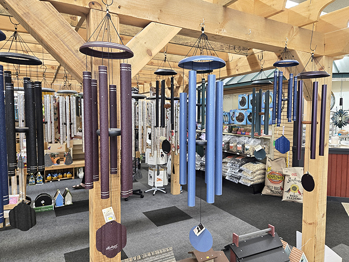 Rustic ceiling fixtures and wind chimes add whimsical touches that enhance the authentic Amish market experience.