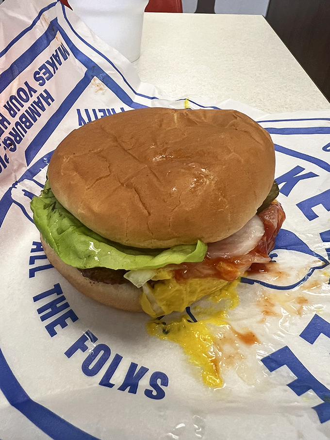 A properly dressed cheeseburger with all the fixings&mdash;proof that sometimes the classics become classics for a very good reason.