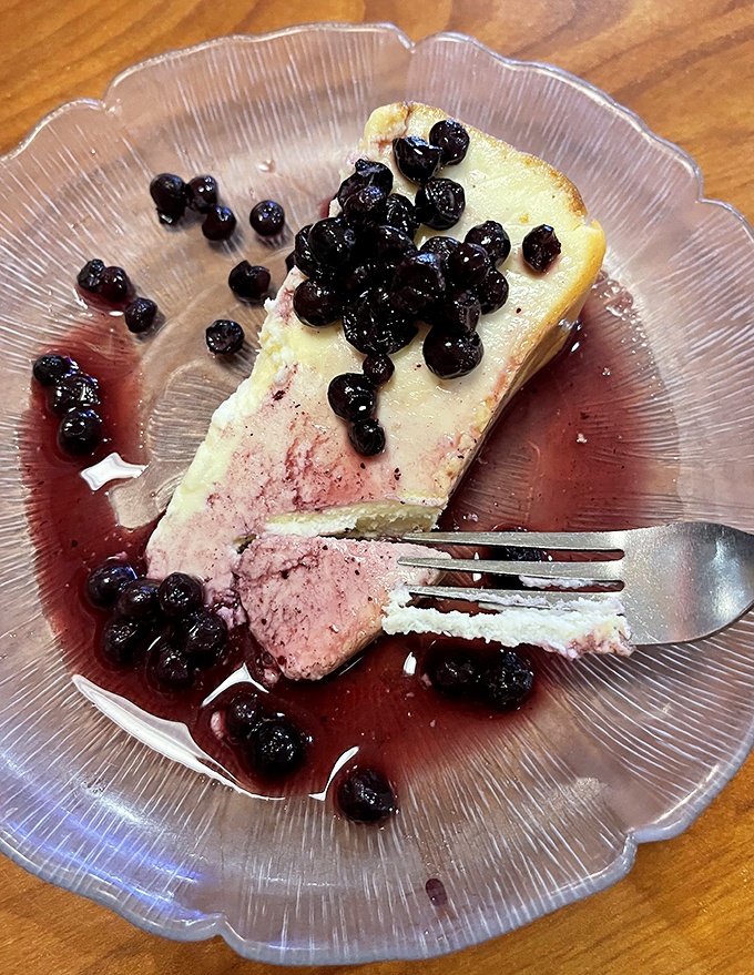 This cheesecake with blueberry compote isn't just dessert&mdash;it's edible artwork that makes you wonder why you ever considered sharing.