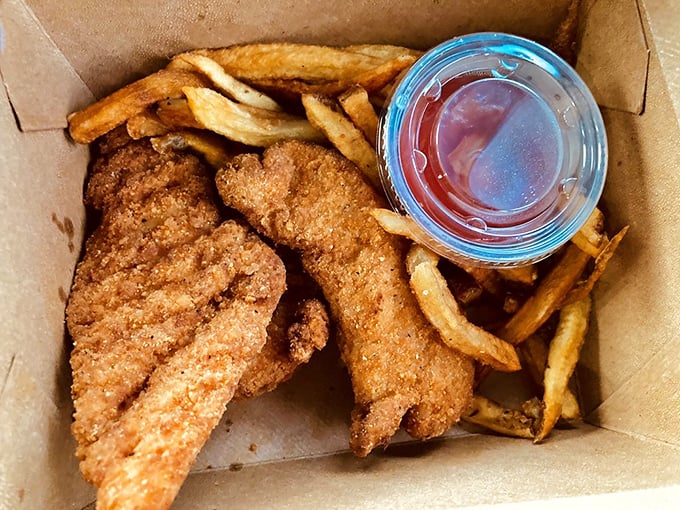 Comfort food in its natural habitat&mdash;golden-fried chicken tenders and fries in an unpretentious box, ready to soothe whatever ails you.
