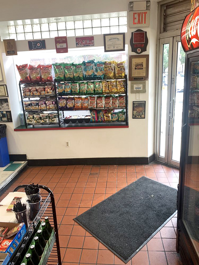 Philadelphia sports memorabilia watches over bags of chips like guardian angels of snackdom. The perfect crunchy sidekick awaits your sandwich selection.