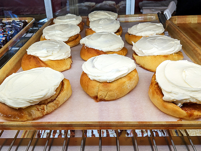 These cinnamon rolls aren't just baked; they're engineered for maximum frosting-to-dough ratio, a mathematical formula that equals pure happiness.