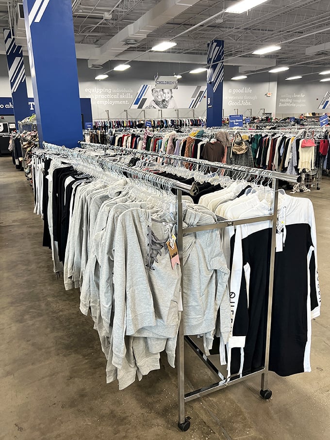 Clothing racks stretching toward the horizon like a textile rainbow. The thrill of the hunt is finding that perfect white shirt among hundreds.