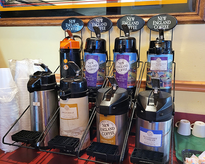 Coffee station that means business&mdash;multiple flavors standing at attention like caffeinated soldiers ready for morning duty. The kind of setup that makes Monday mornings slightly less criminal. 