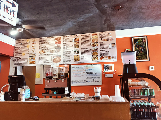 Where the magic happens – a menu board that reads like a travel itinerary through Latin America's greatest culinary hits.