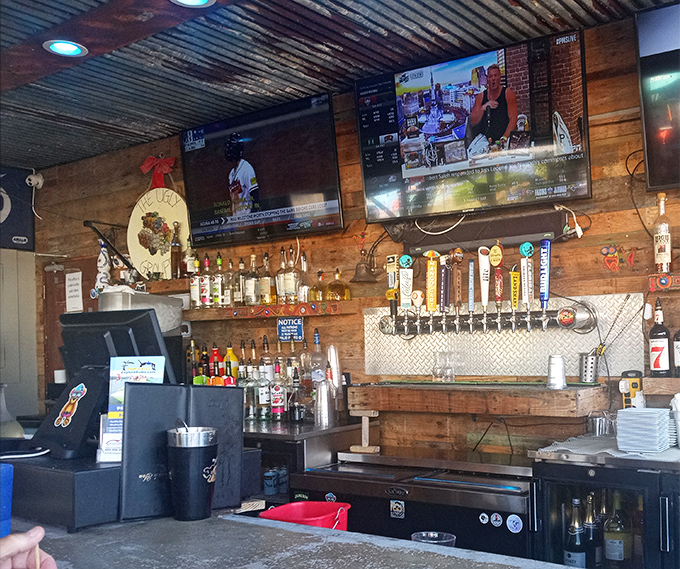 The bar area buzzes with energy while multiple screens ensure you never miss the action.
